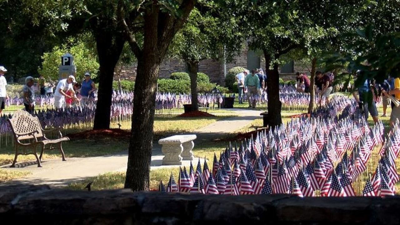Hundreds of volunteers help plant thousands of flags ahead of Memorial ...